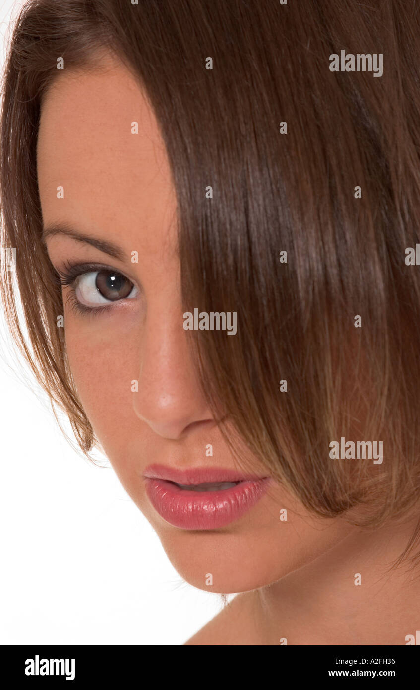 Closeup teenage girl with hair covering eye Stock Photo - Alamy