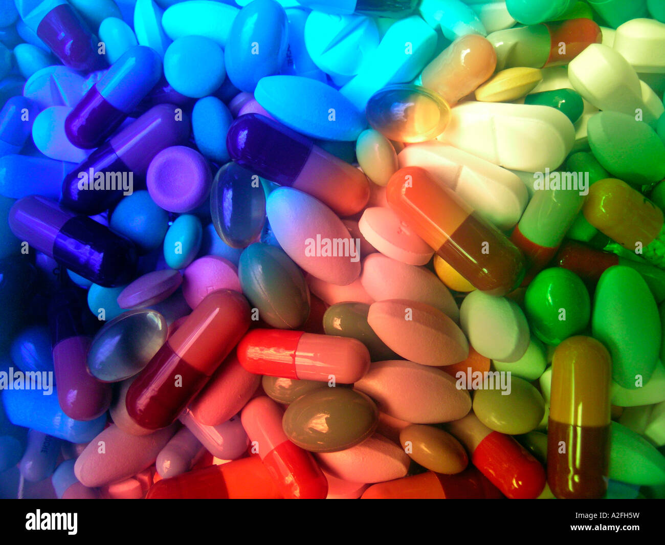 Many different colourful pills and capsules Stock Photo - Alamy