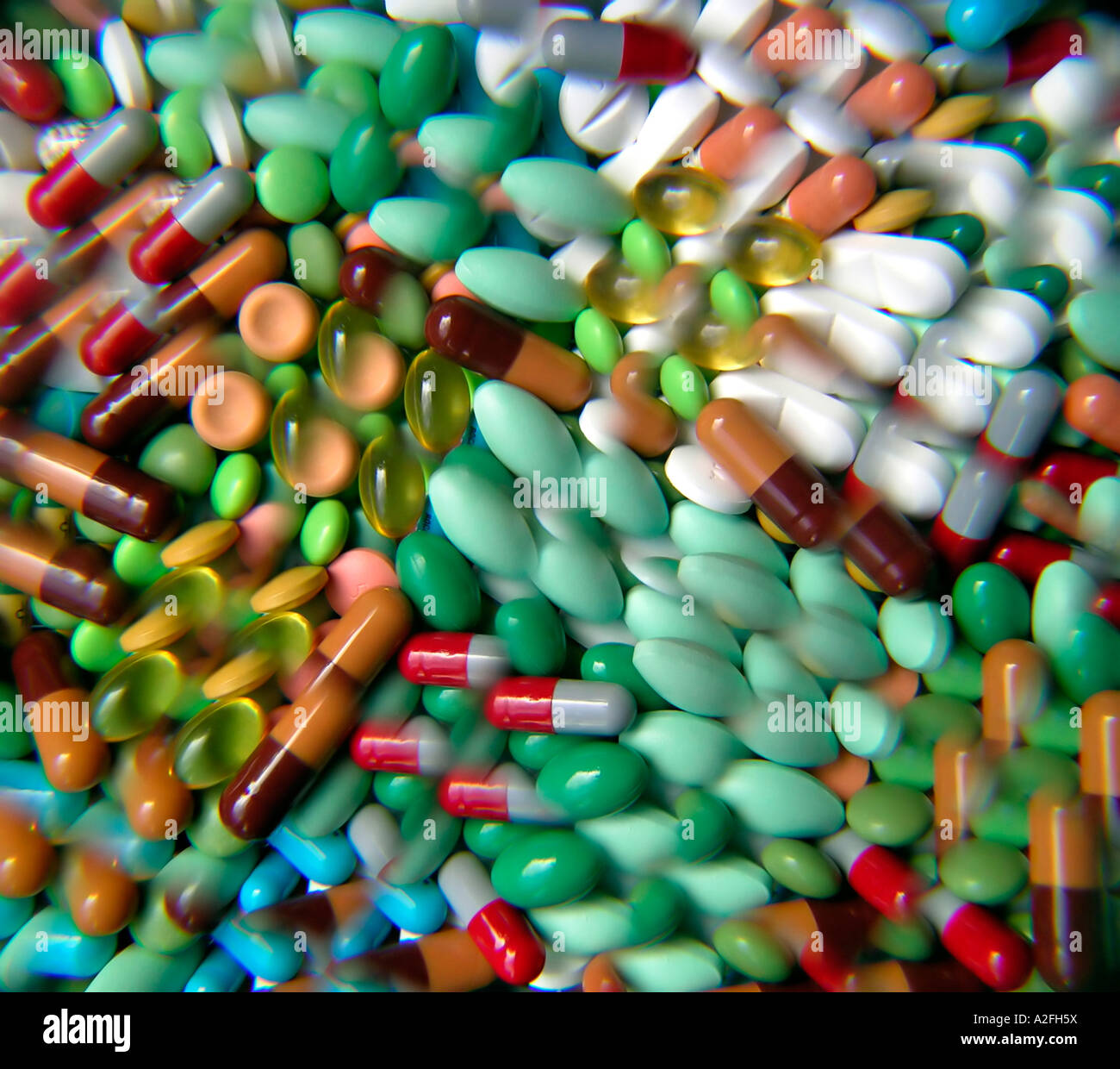 Many different colourful pills and capsules Stock Photo - Alamy