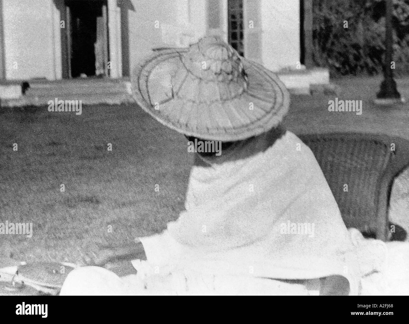 Wearing gandhi cap Black and White Stock Photos & Images - Alamy