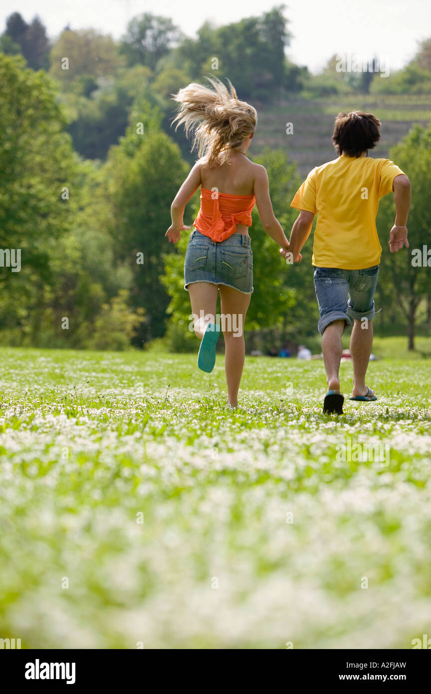 Man in jeans running rear view hi-res stock photography and images - Alamy