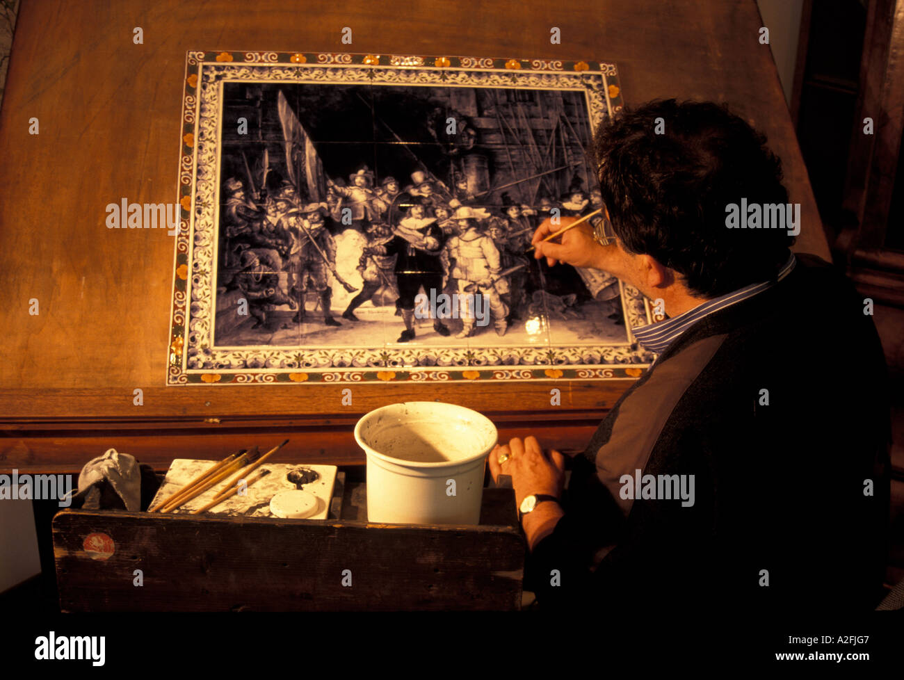 Europe, The Netherlands, Holland, Delft, Delft porcelain painter (MR ...