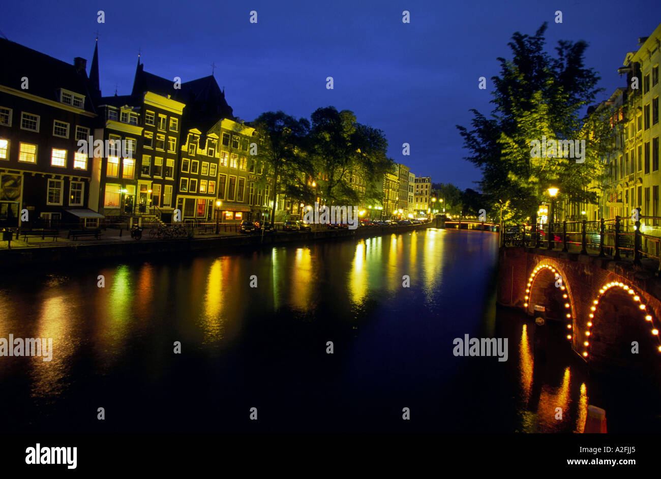 Netherlands, Amsterdam. Lighted night scene Stock Photo - Alamy