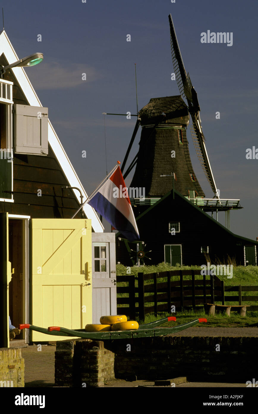Europe, Netherlands, Zaanstad. Cheese skid, barn and windmill Stock ...