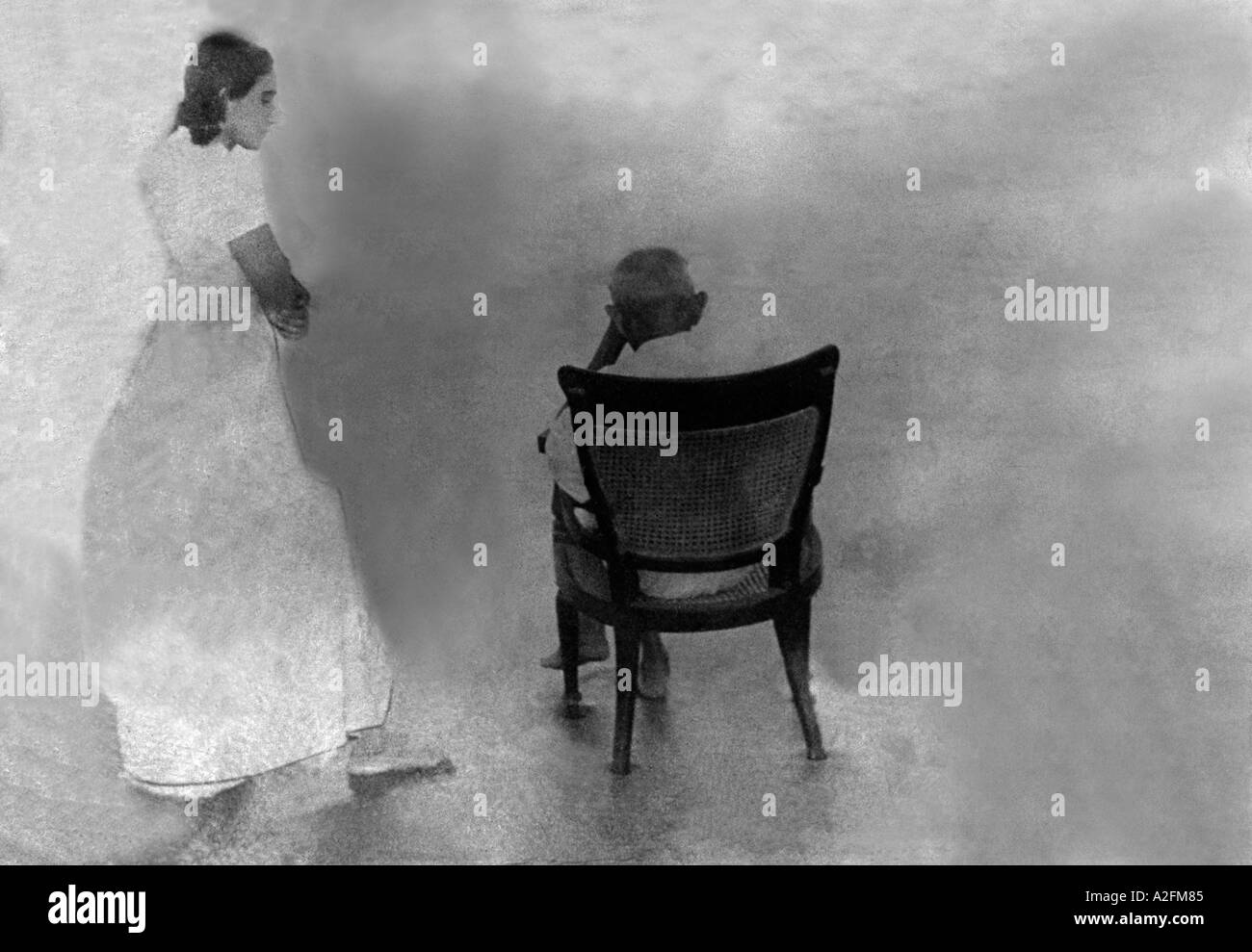 Mahatma gandhi sitting in chair hi-res stock photography and images - Alamy