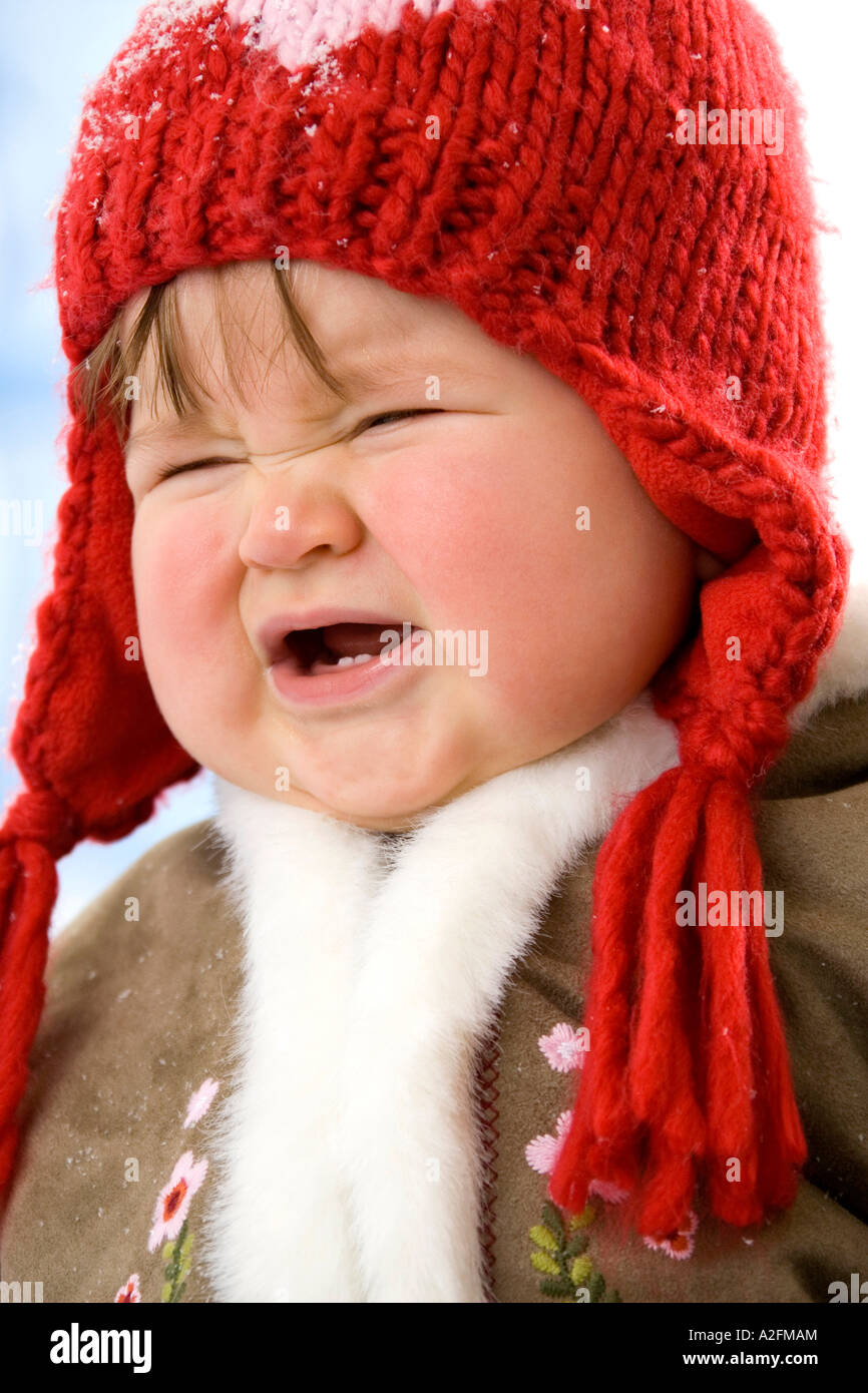 Girl ( 1-2 ) wearing cap, crying, close-up Stock Photo - Alamy