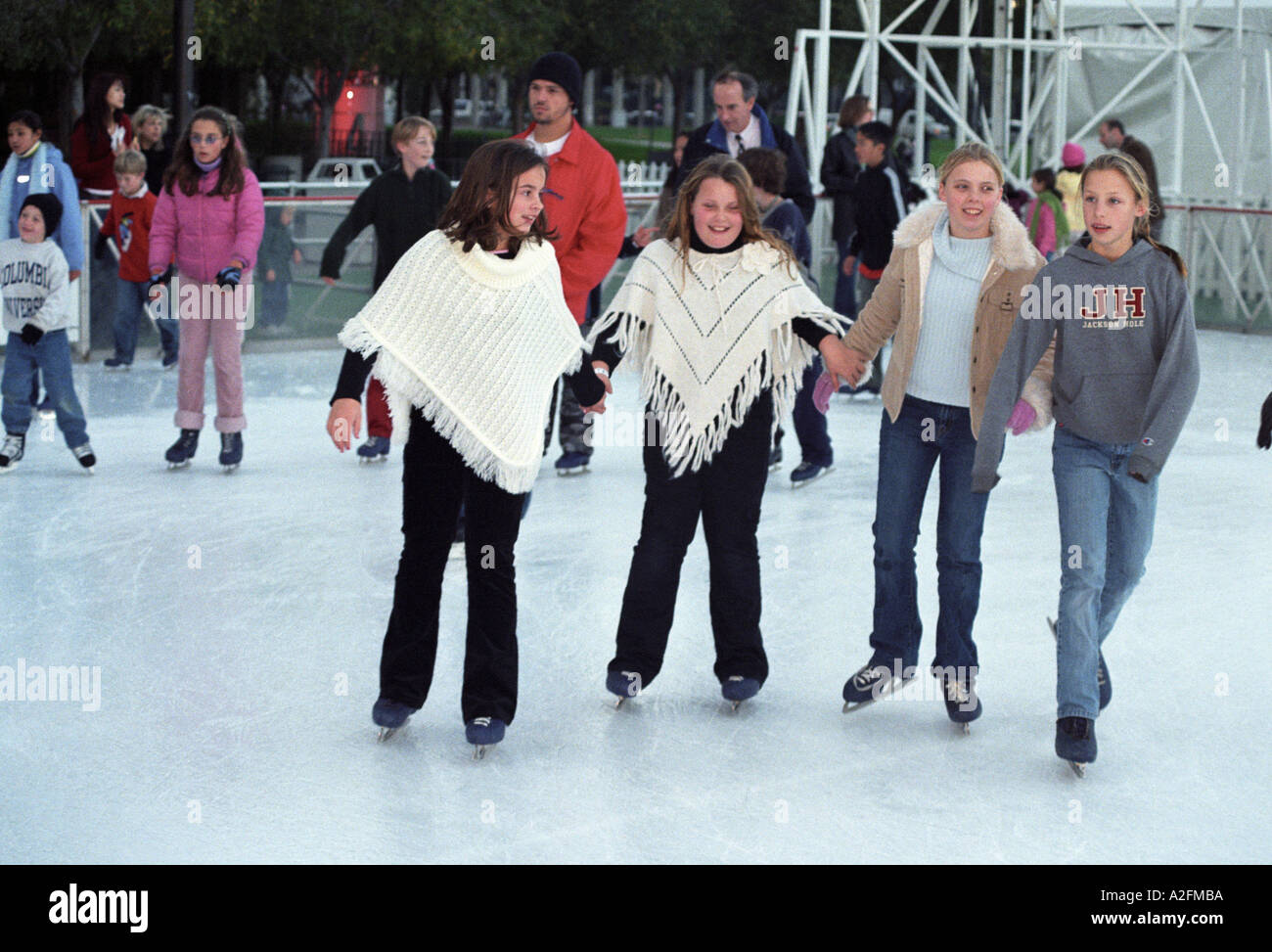 Girls ice skating hi-res stock photography and images - Alamy