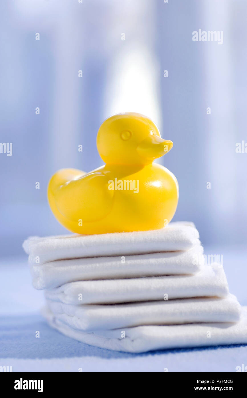 Rubber duck on top of stacked diapers Stock Photo - Alamy