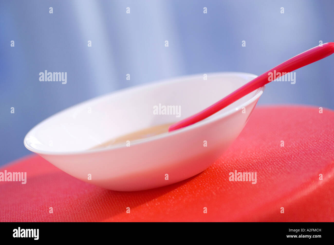 Bowl with plastic spoon and pap Stock Photo - Alamy