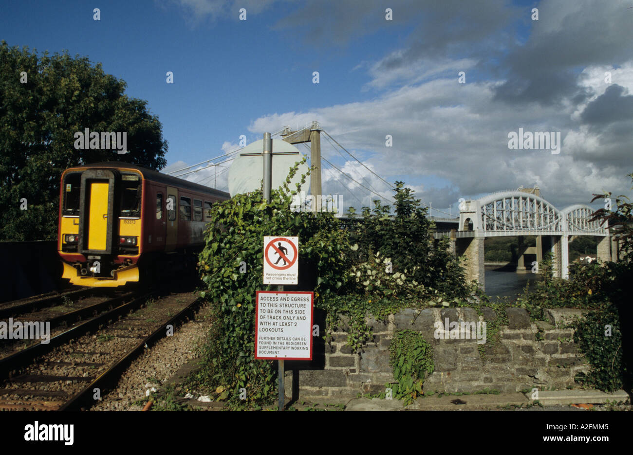 Train crossing the Brunel Bridge Royal Albert Bridge and arriving in ...