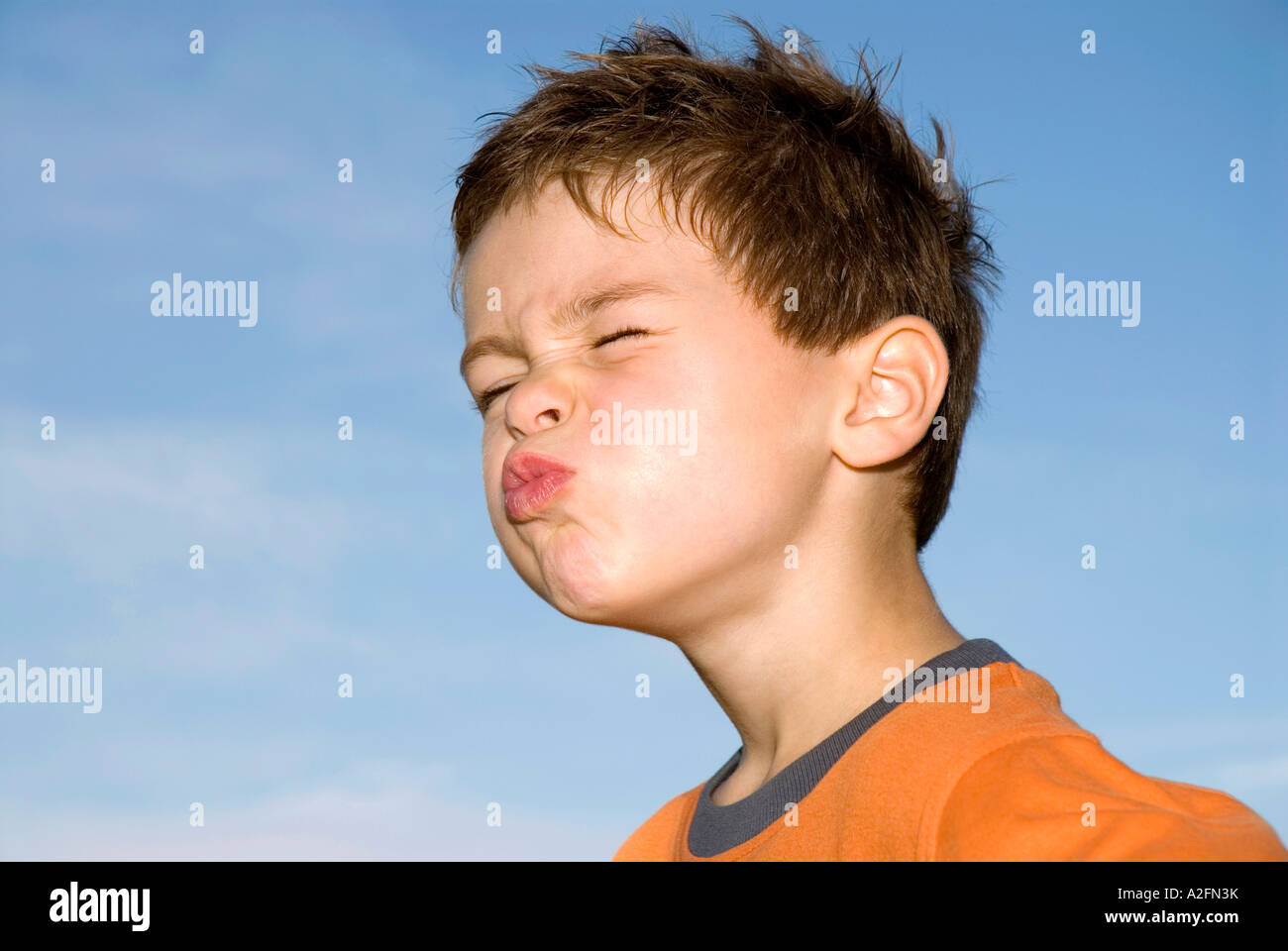 Boy (4-7) grimacing, close-up Stock Photo - Alamy