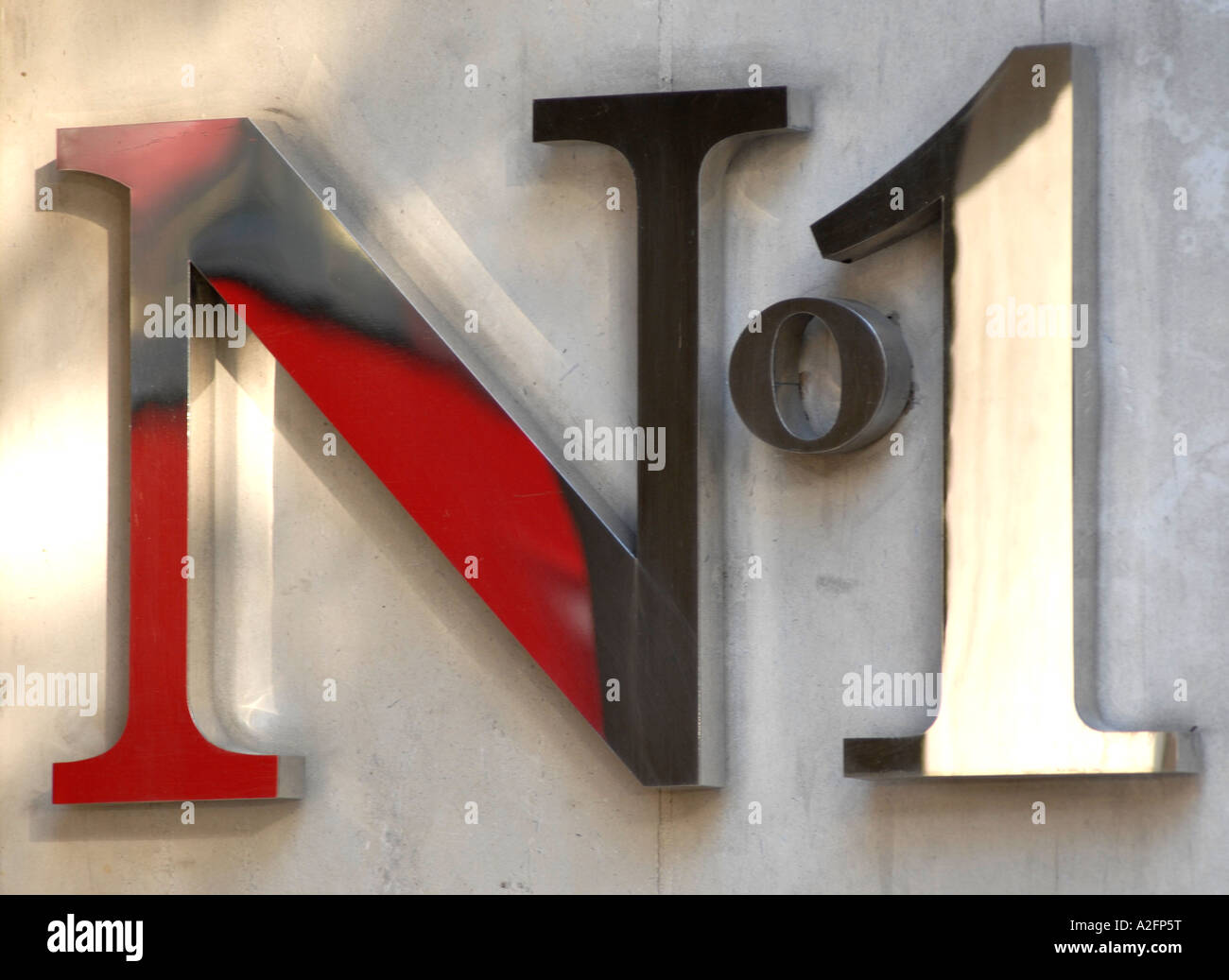 Polished stainless steel No 1 sign on a building in the City of London ...