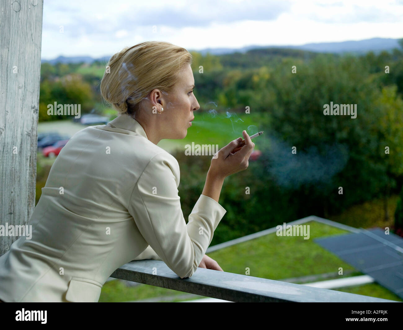 Female thinking life smoking cigarette hi-res stock photography and ...