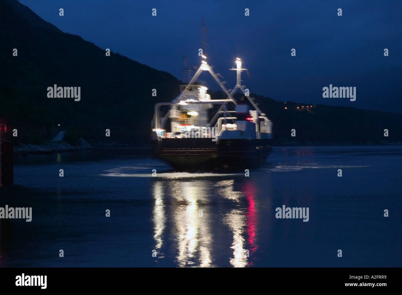 A late night ferry crosses the misty Hardanger Fjord, Norway Stock ...
