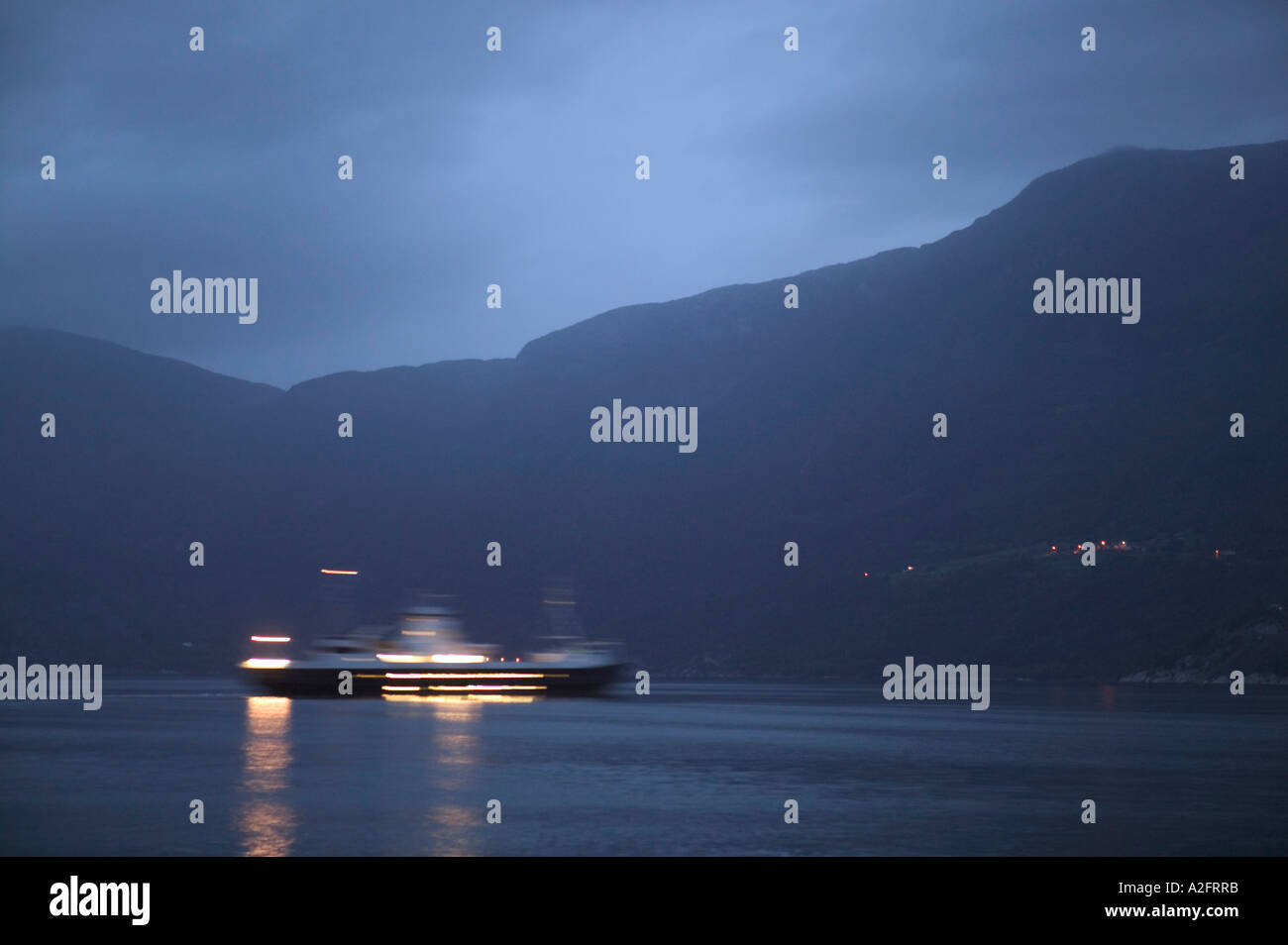 A late night ferry crosses the misty Hardanger Fjord , Norway Stock ...
