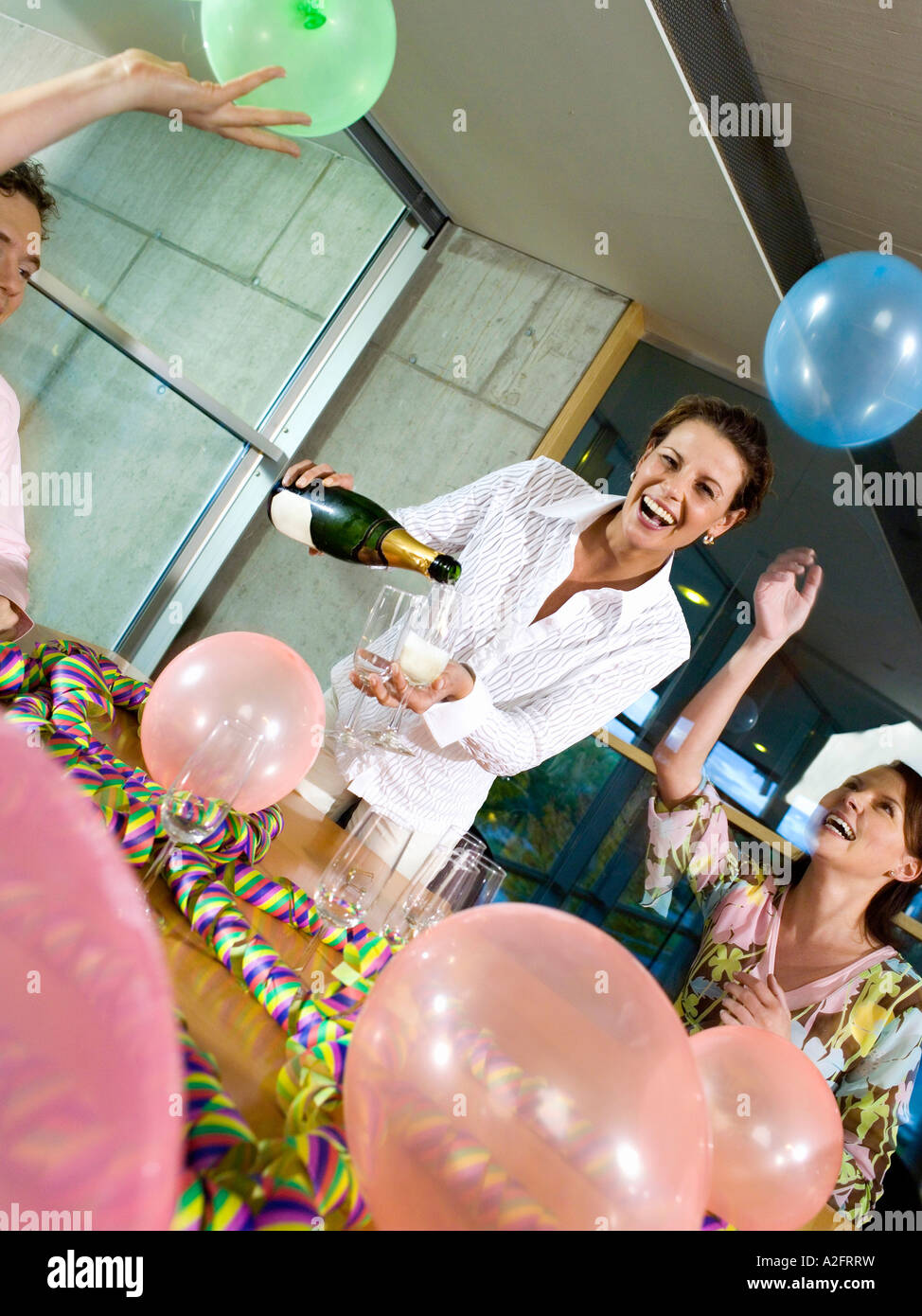 Young professionals having company party Stock Photo - Alamy