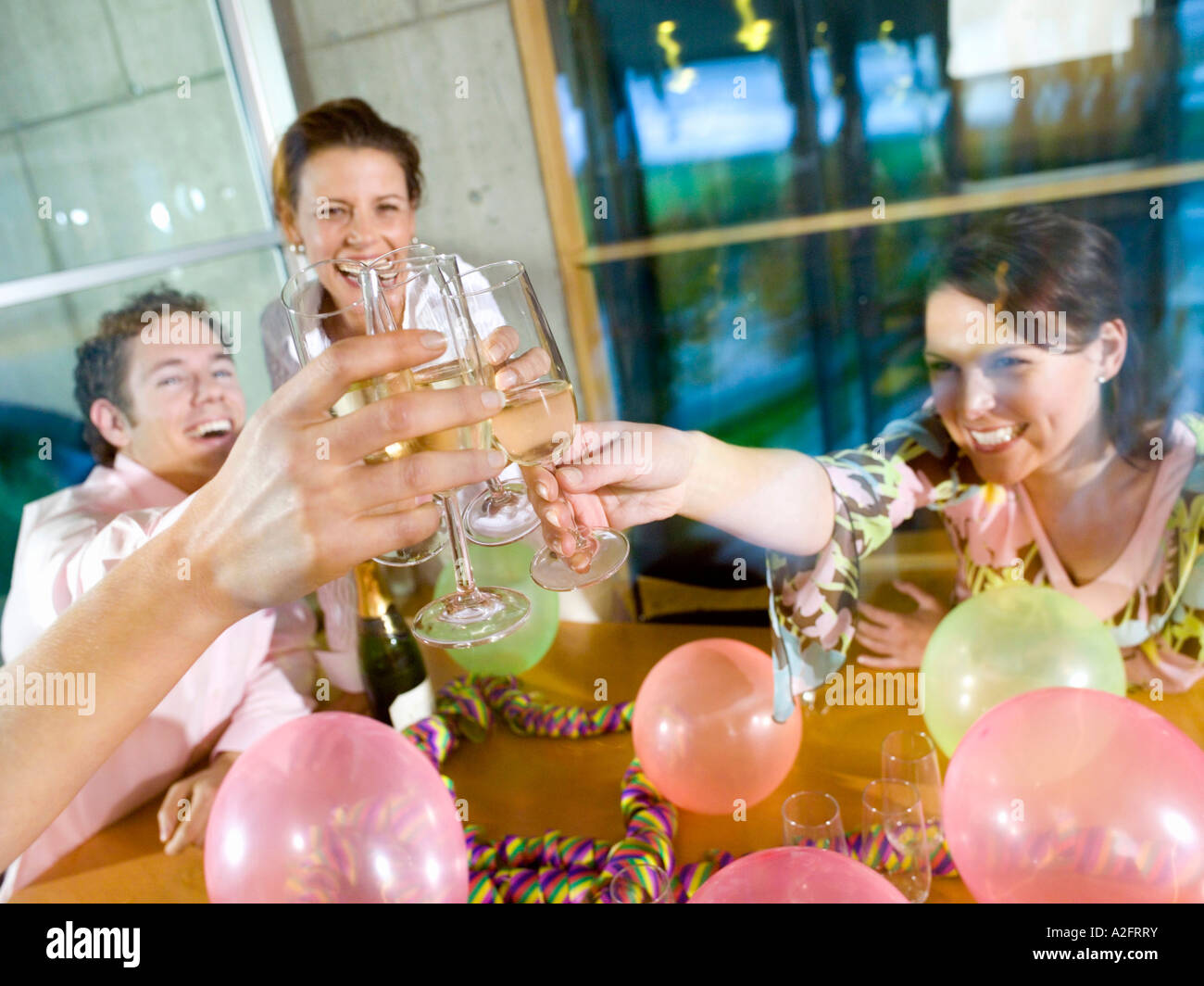 Young professionals having company party Stock Photo - Alamy