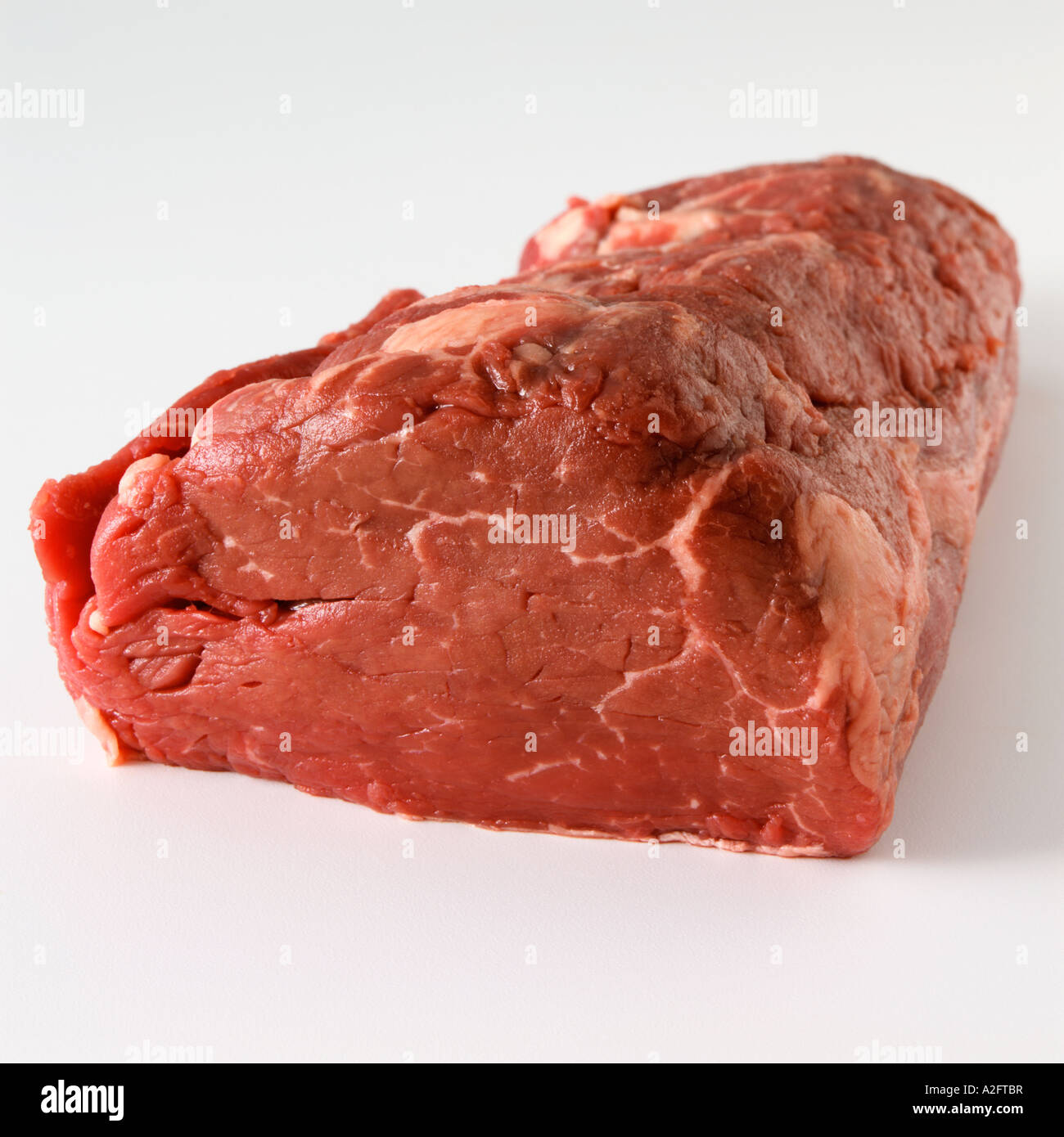 A whole beef fillet on a white background Stock Photo - Alamy