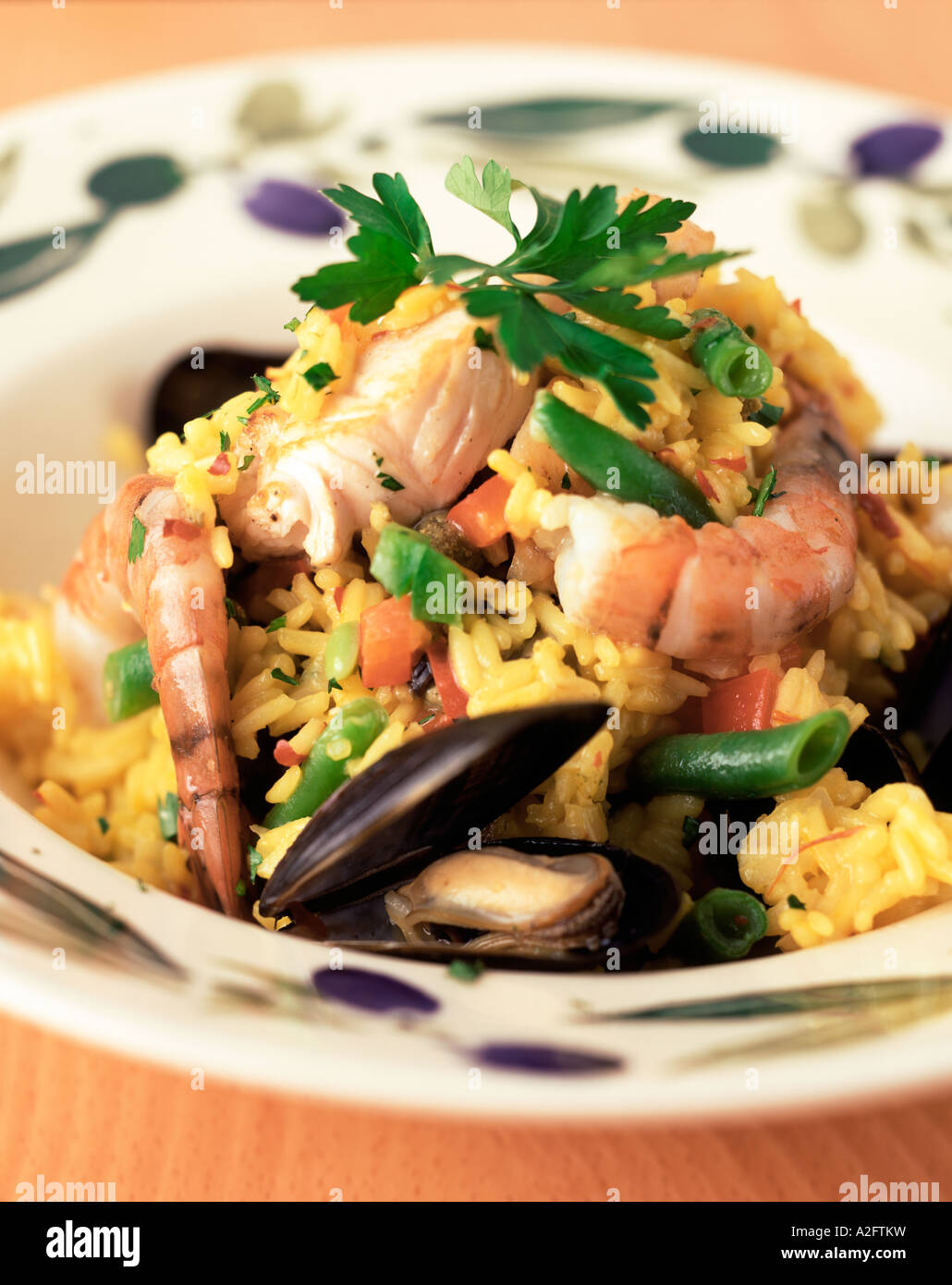 Plate paella seafood chicken close hi-res stock photography and images ...