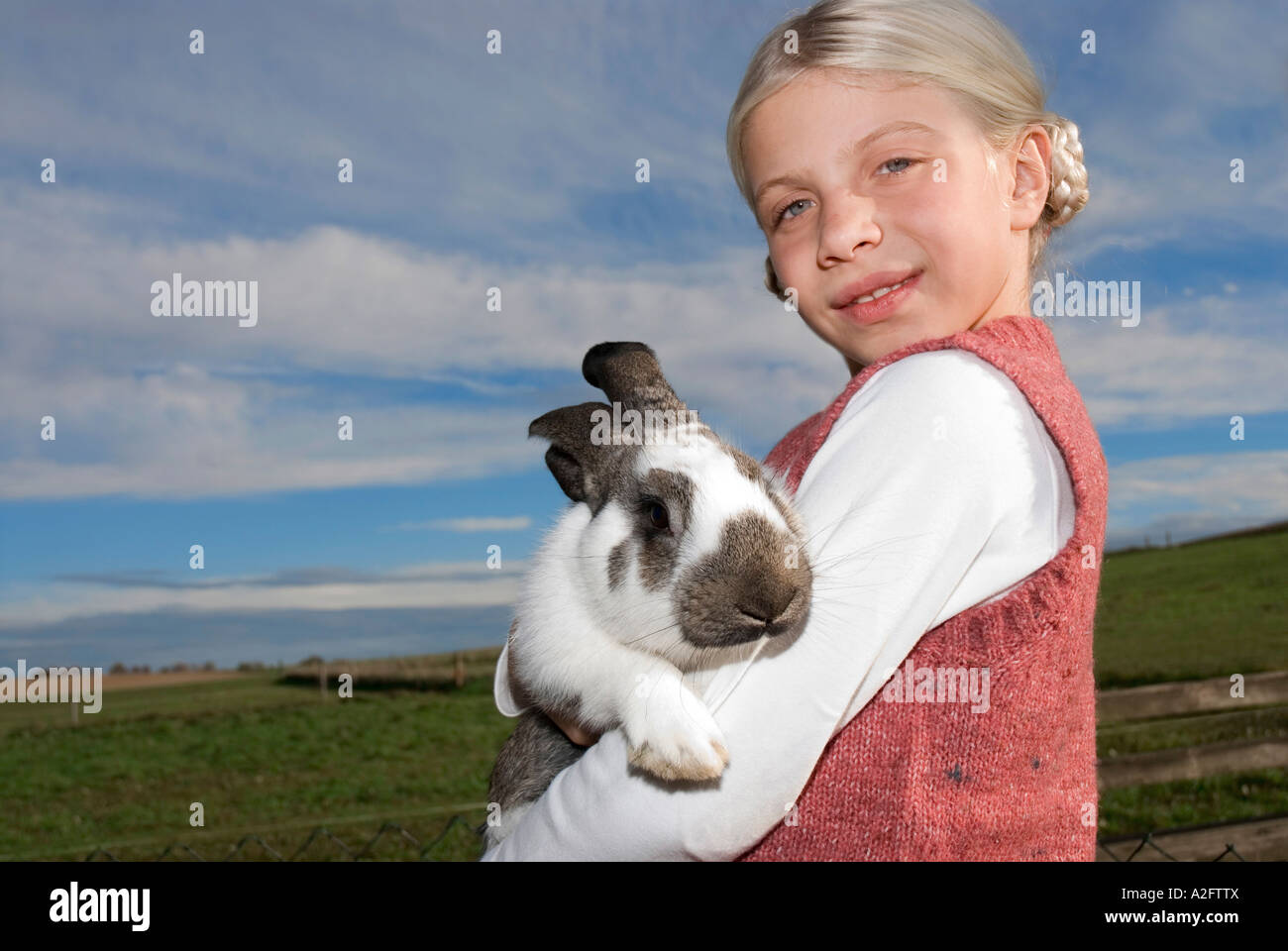 Girl 7 9 holding rabbit in hi-res stock photography and images - Alamy