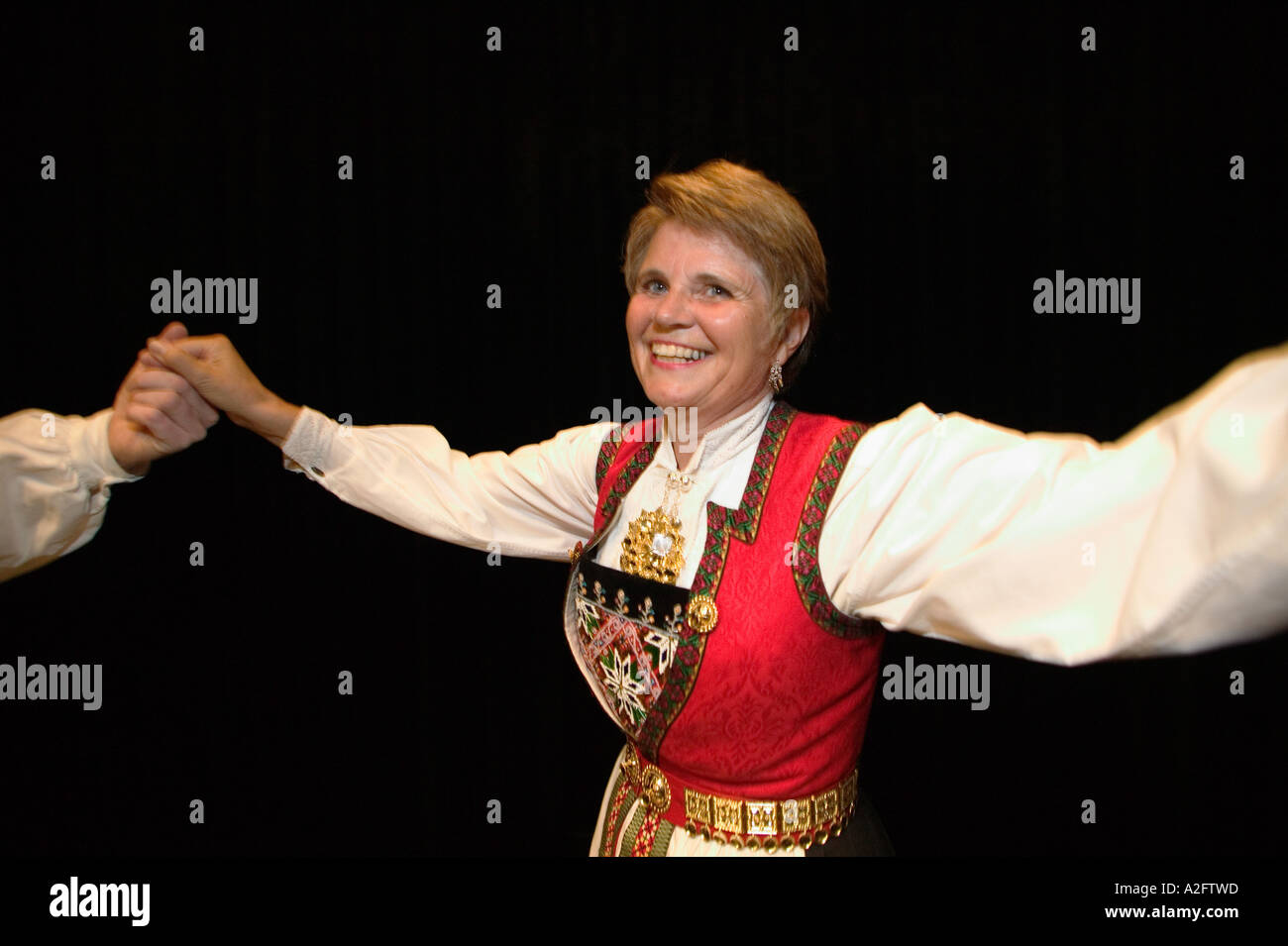 Bergen traditional Norwegian folk dancer. Costumes are designed in the ...