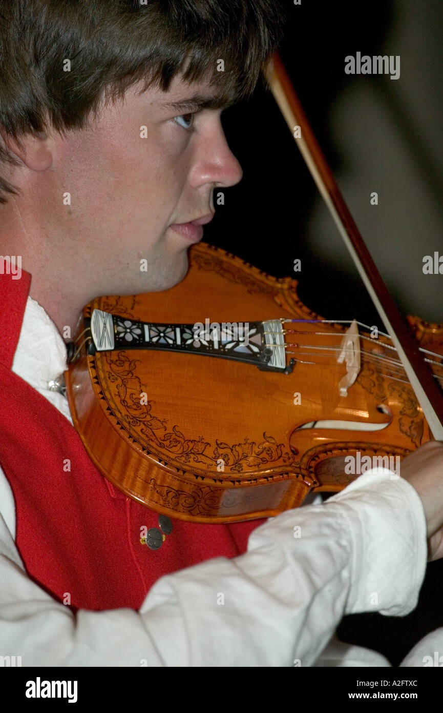 Hardanger fiddle, traditional Norwegian folk music, adorned in mother ...