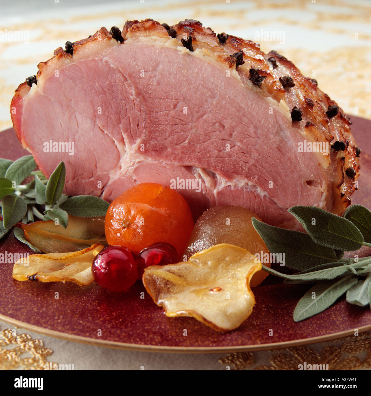A glazed ham studded with cloves Stock Photo - Alamy
