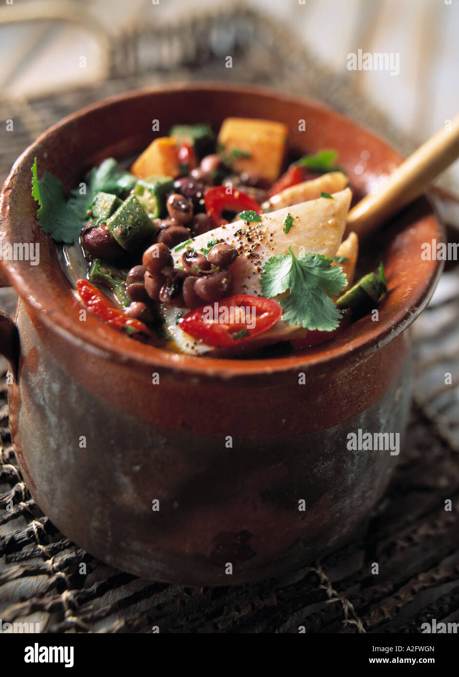 A pot full of Jamaican fish stew Stock Photo - Alamy