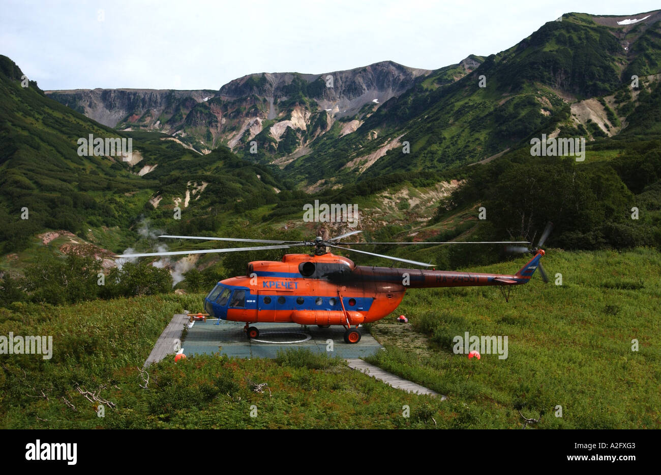 Asia, Russia, Russian Far East, Kamchatkan Peninsula. Helicopter taking ...