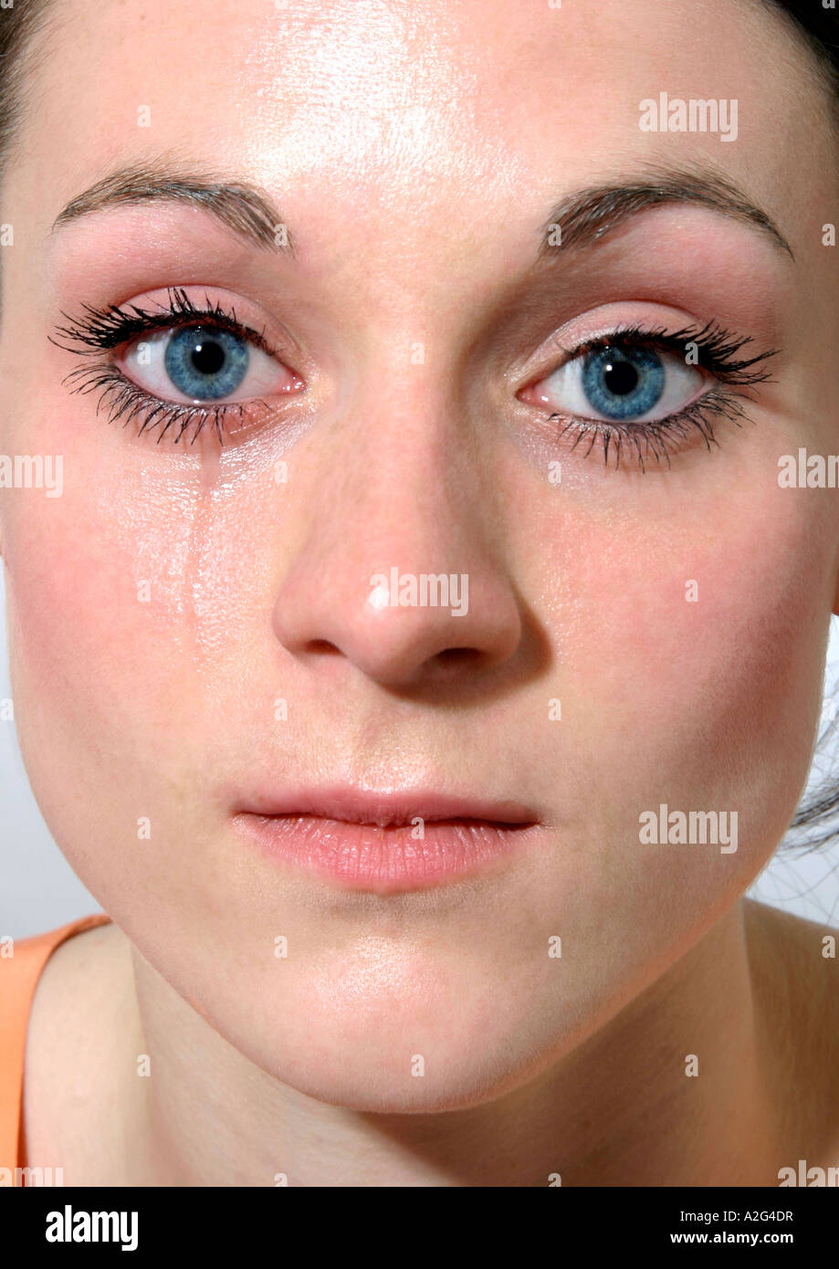 Woman tear cheek hi-res stock photography and images - Alamy