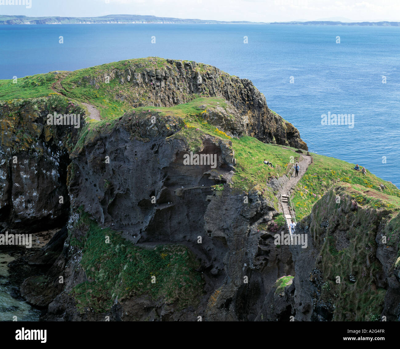rocky promontory on irelands north east coast Stock Photo - Alamy