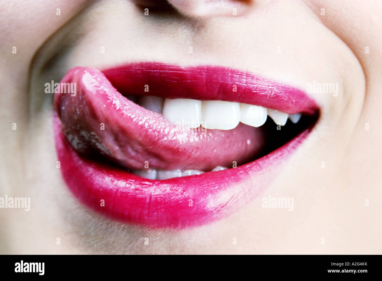 Close up lips tongue young woman hi-res stock photography and images ...