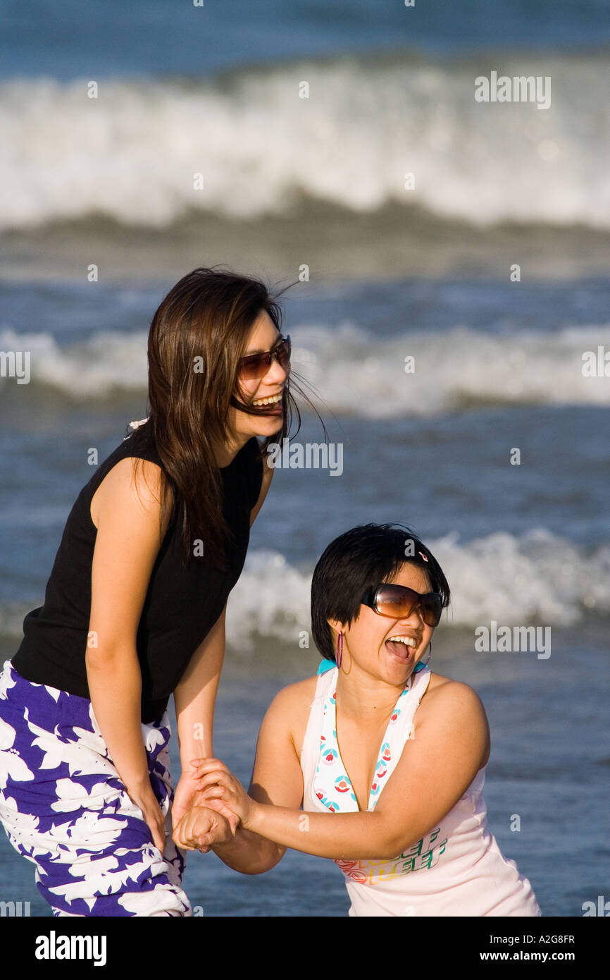 Girls at beach Stock Photo - Alamy