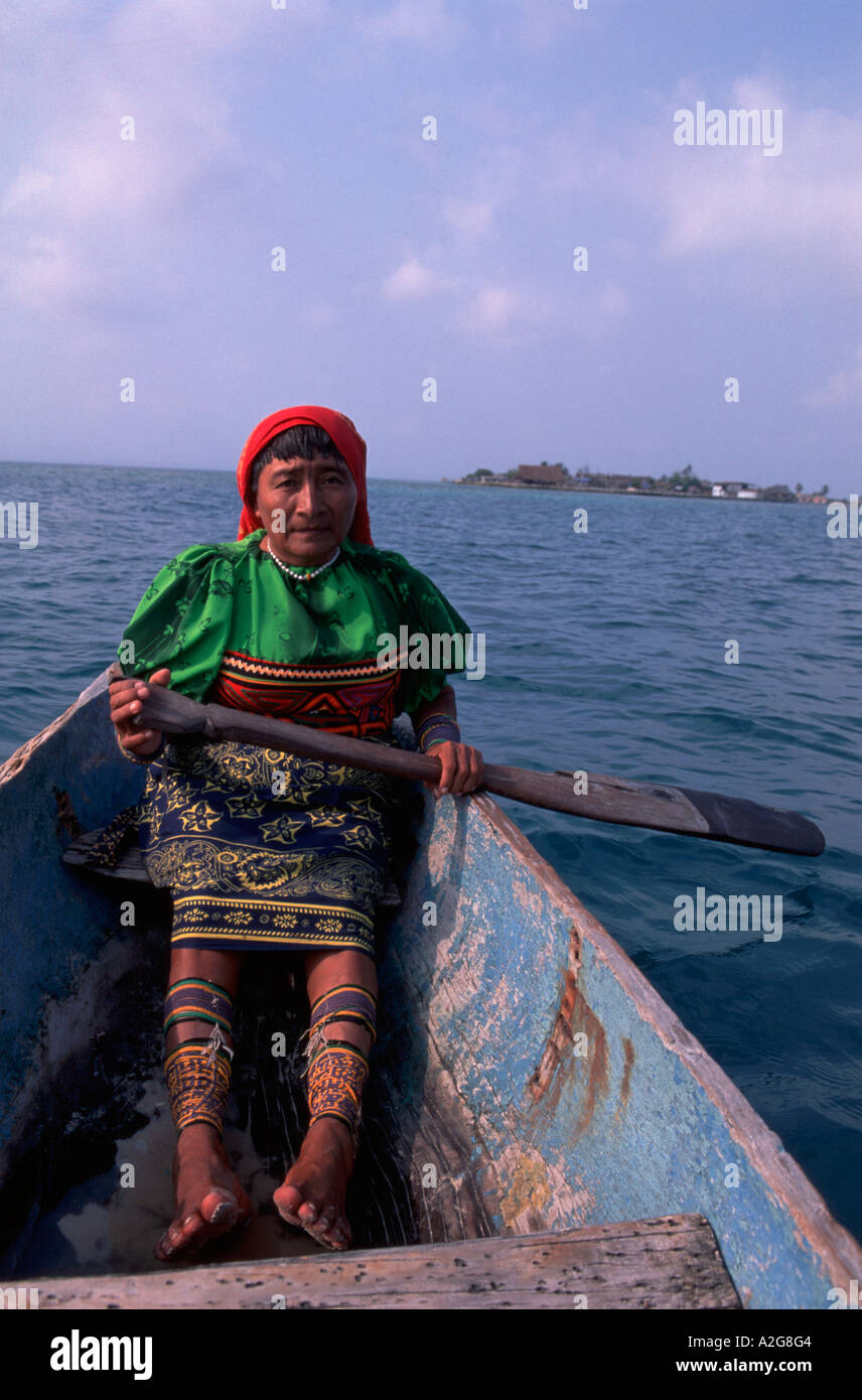 Panama, Kuna woman in duguout canoe. Kuna Indians are a tribal society ...