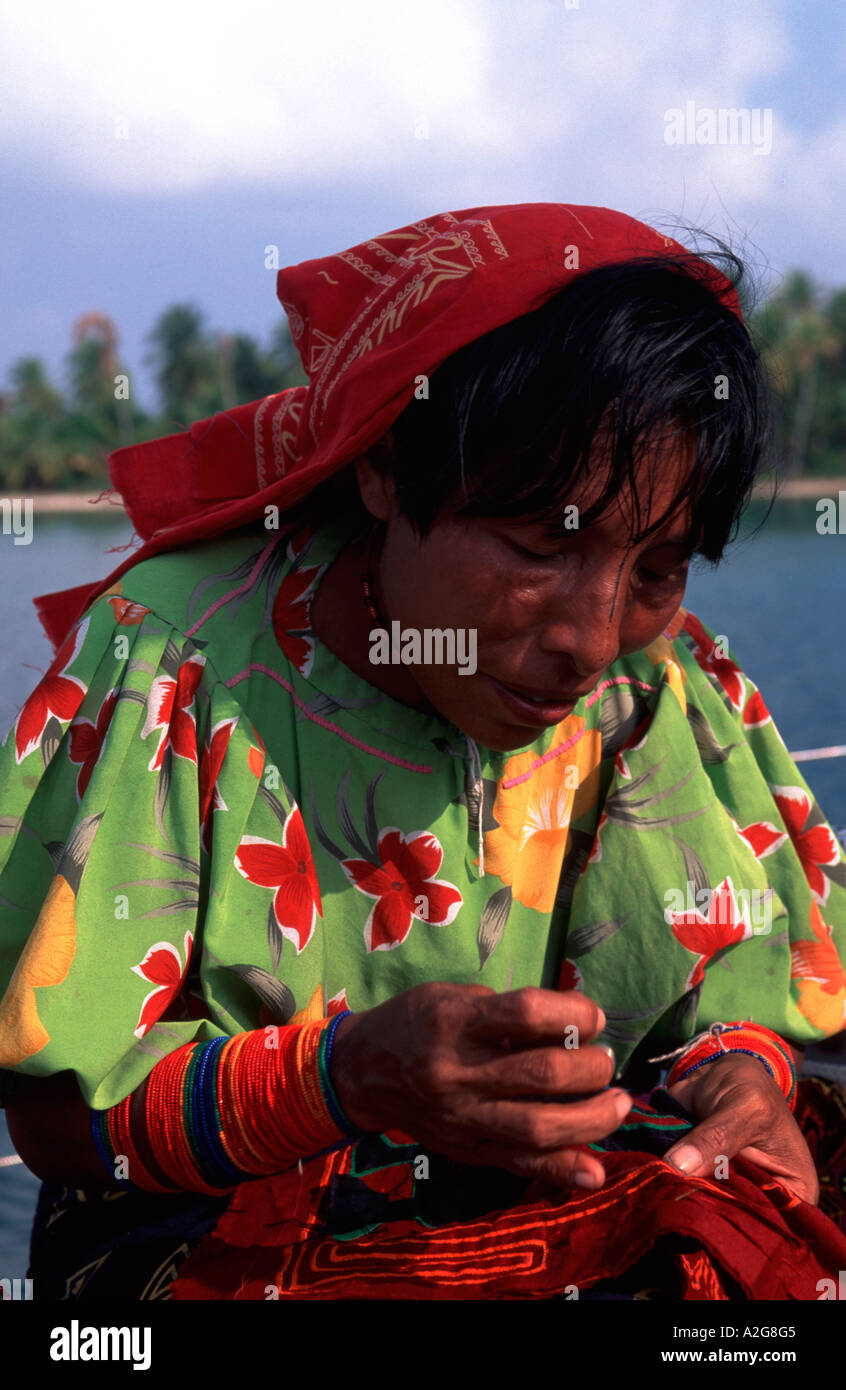 Panama, Kuna woman sewing a mola. Kuna Indians run the islands ...