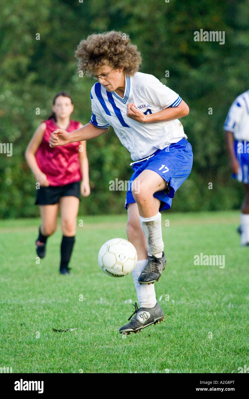 Kid trapping soccer ball hi-res stock photography and images - Alamy