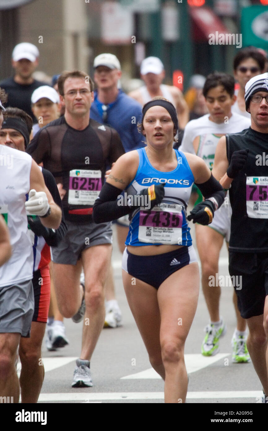 Woman running marathon Stock Photo - Alamy