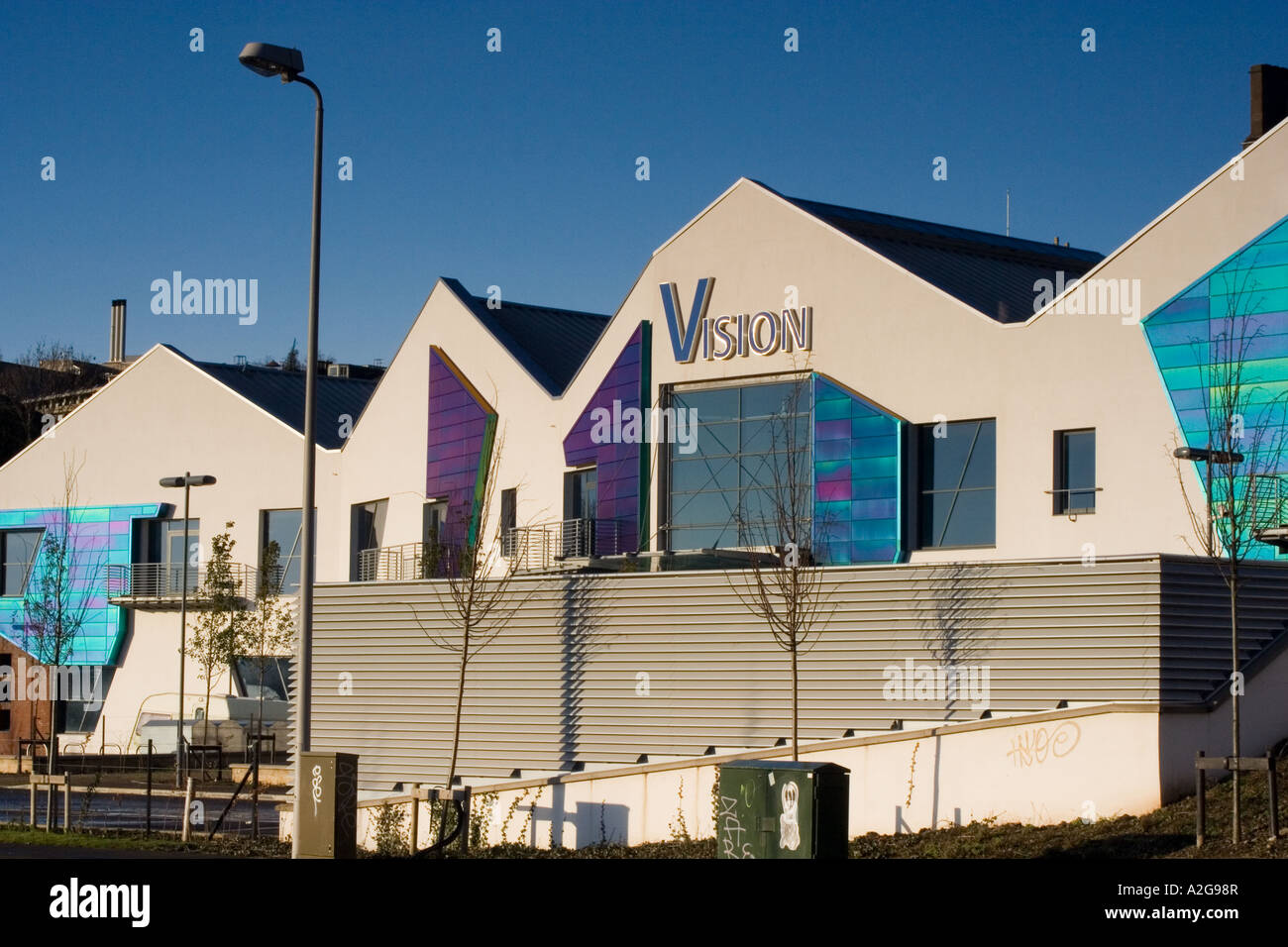 Direct sunlight on the front of the new Vision office building in ...