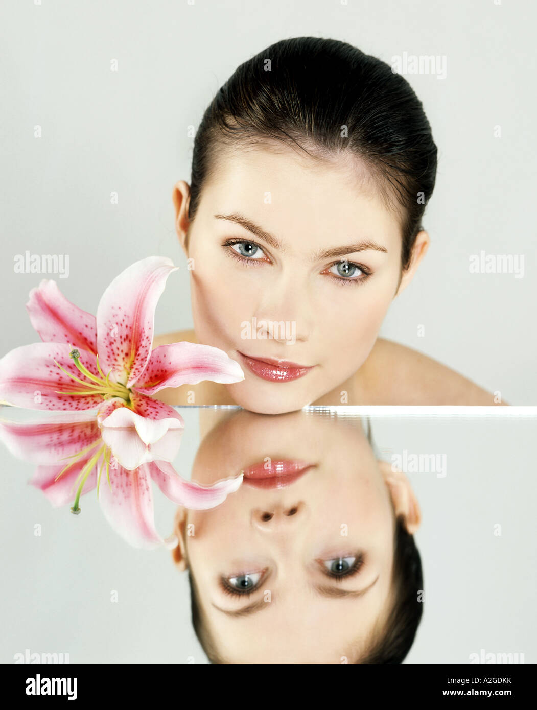 1216506 indoor studio young woman 20 25 brunette hair brown lily pink ...