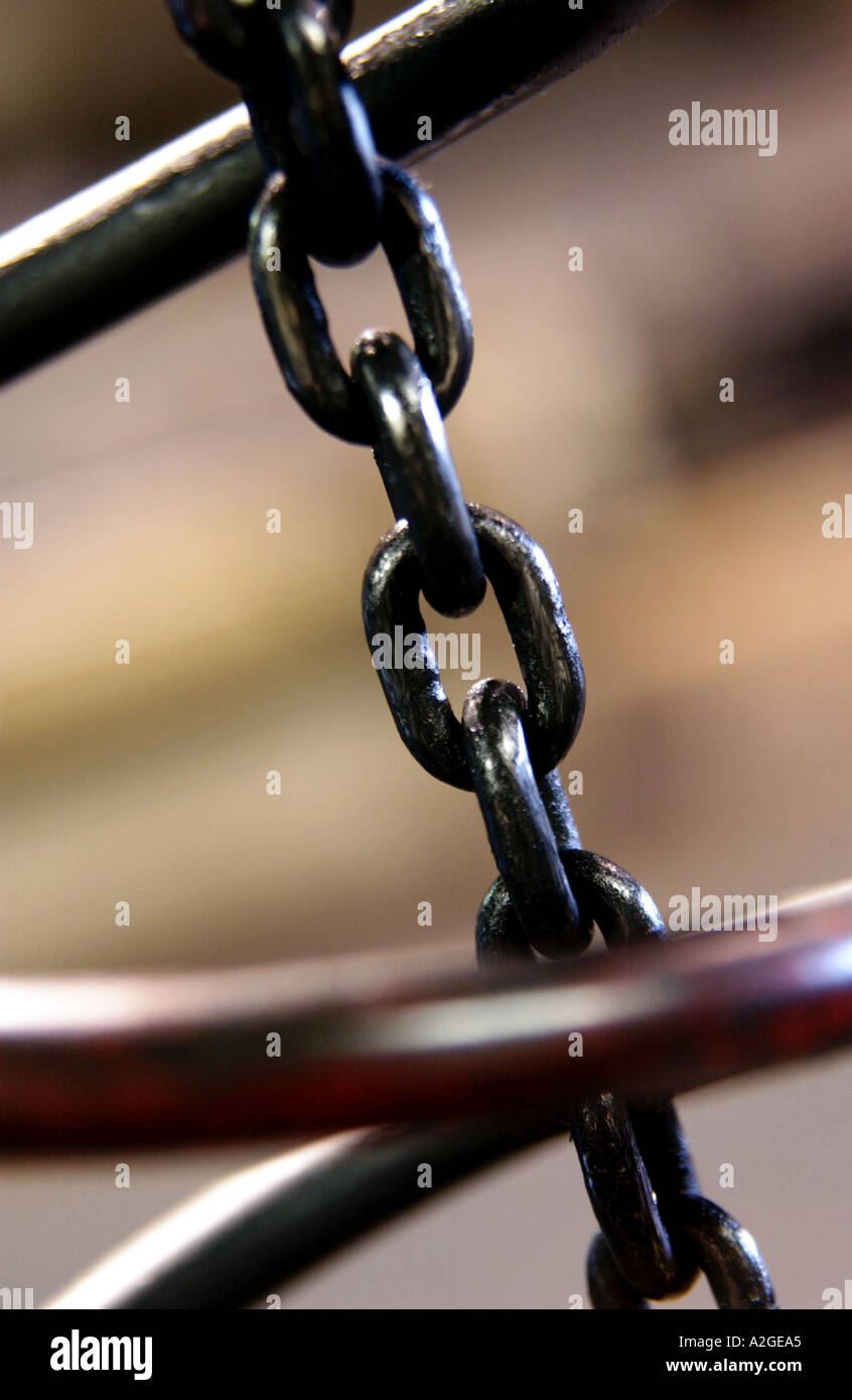 Detail of chain in factory Stock Photo - Alamy