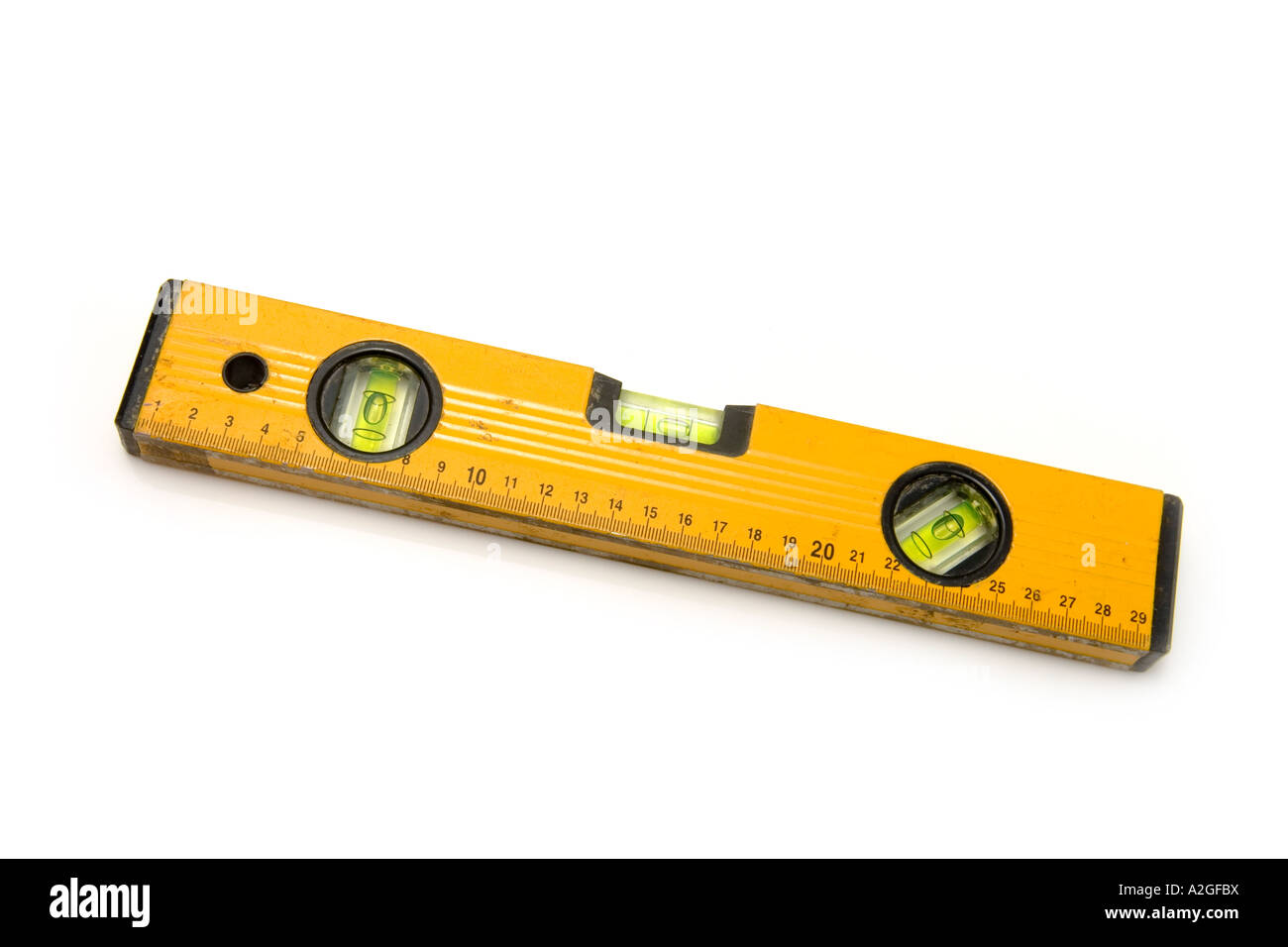 Spirit level isolated on a white studio background Stock Photo - Alamy