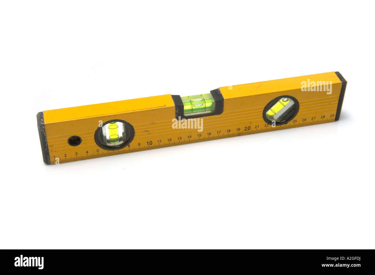 Spirit level isolated on a white studio background Stock Photo - Alamy