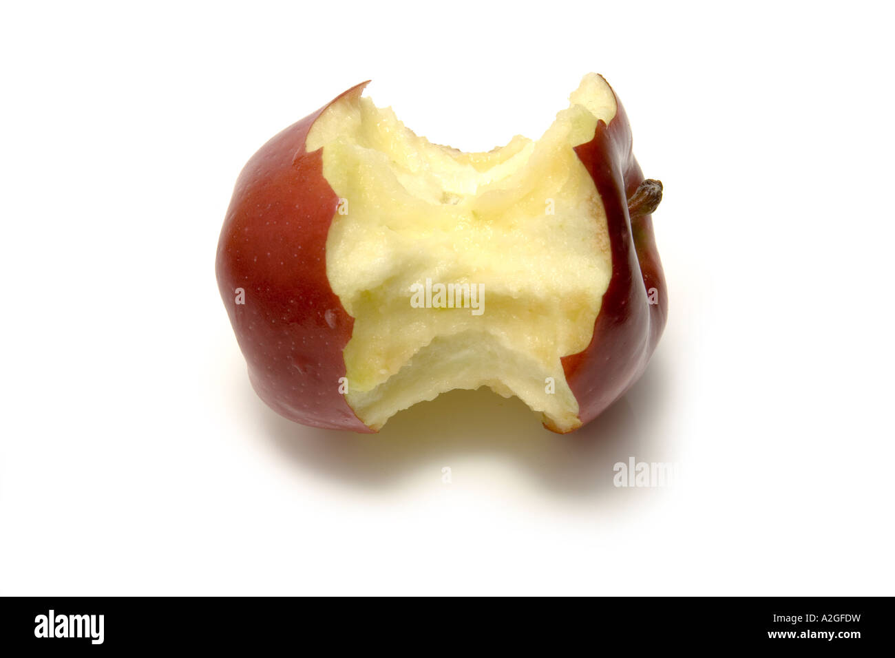 Apple core isolated on a white studio background Stock Photo - Alamy