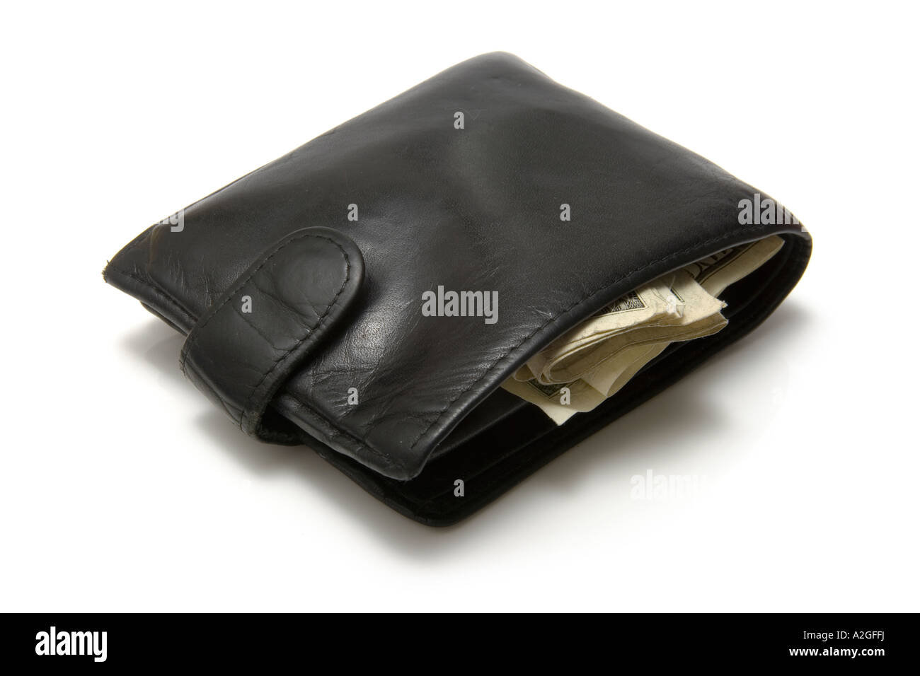 Leather wallet filled with cash isolated on a white studio background ...