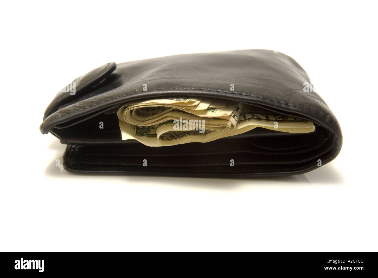 Wallet filled with cash isolated on a white studio background Stock ...