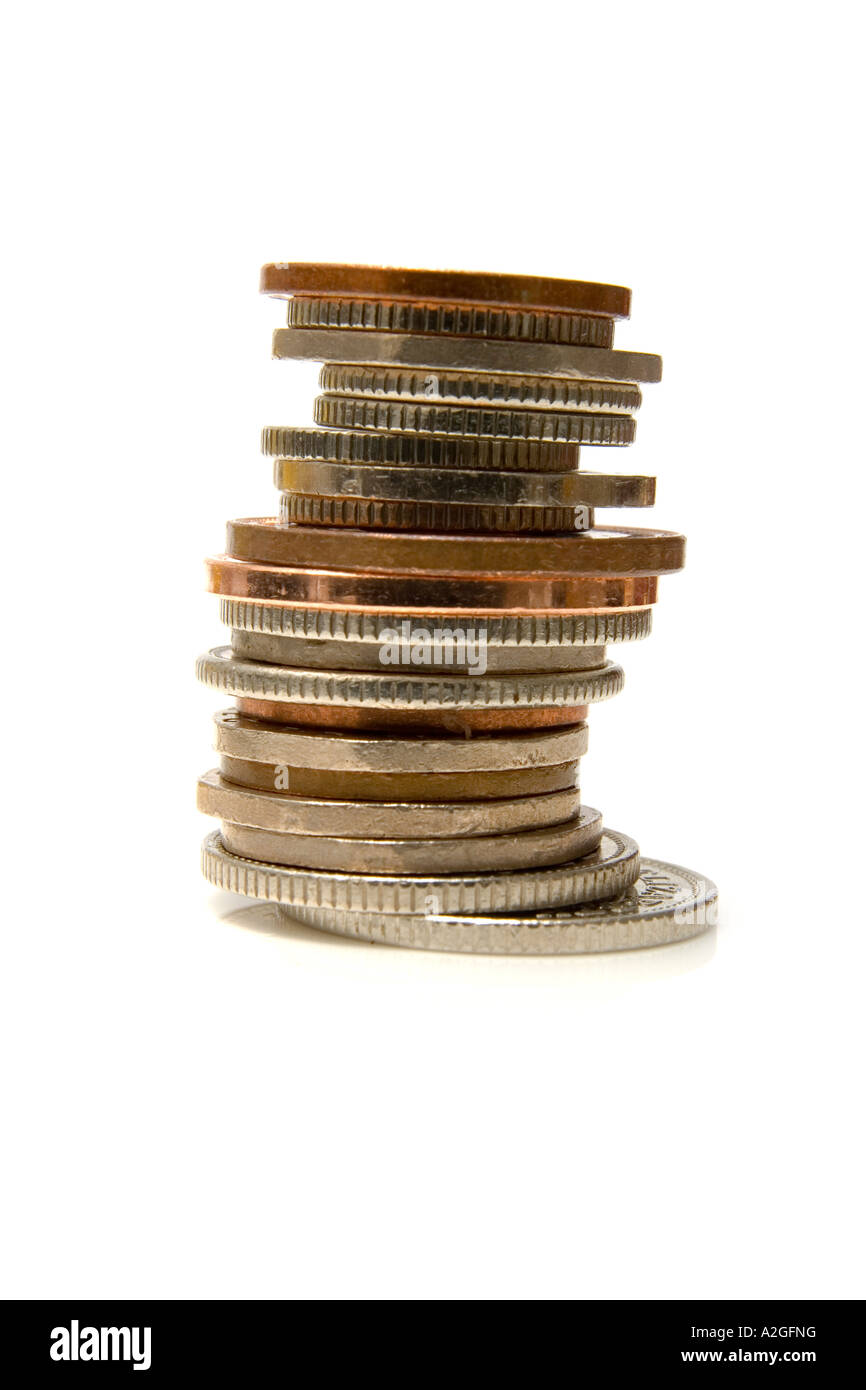 Stack of coins isolated on a white studio background Stock Photo - Alamy