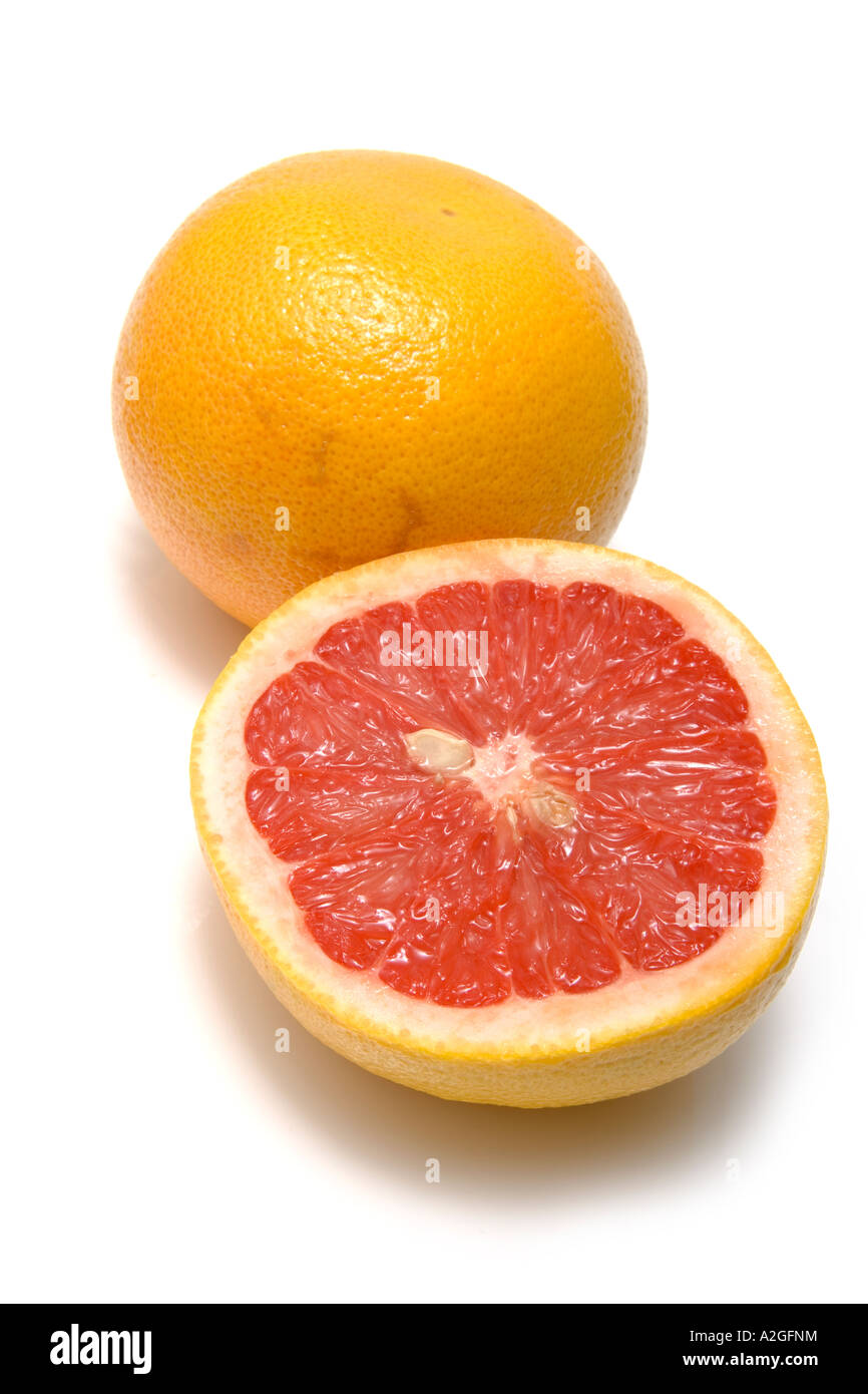 Grapefruit whole and halved isolated on a white studio background Stock ...
