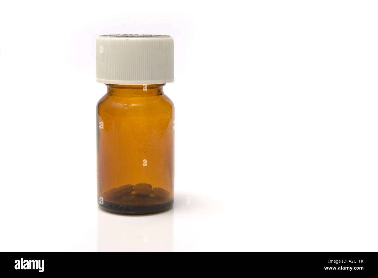 Medicine bottle with childproof cap isolated on a white studio ...