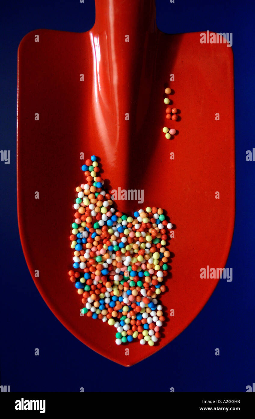 kids spade with iced sugar sprinkles Stock Photo - Alamy