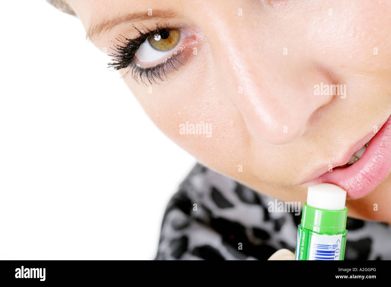 Young Woman Using Lip Balm Model Released Stock Photo - Alamy